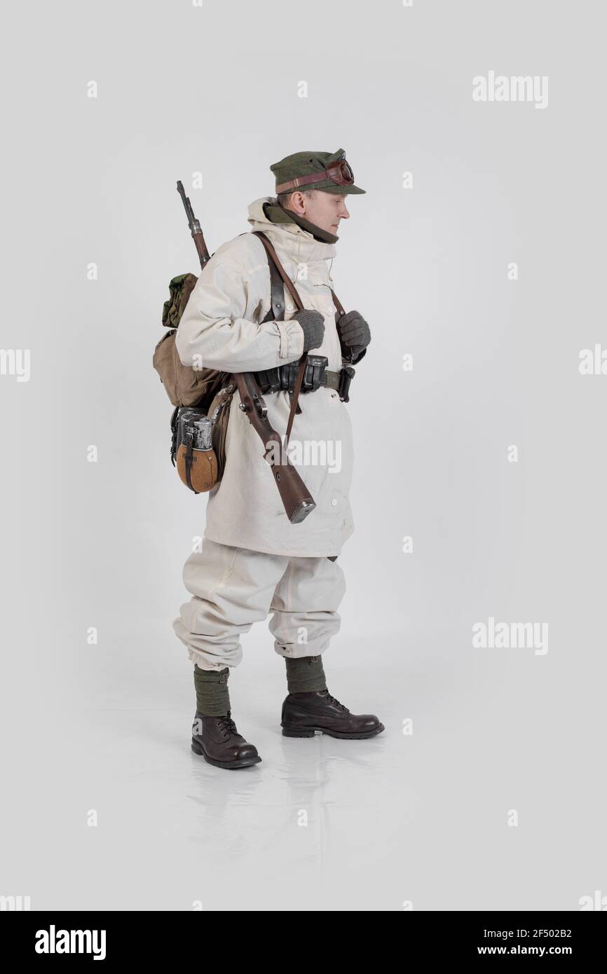 male actor in the winter military uniform of an German soldier, the ...