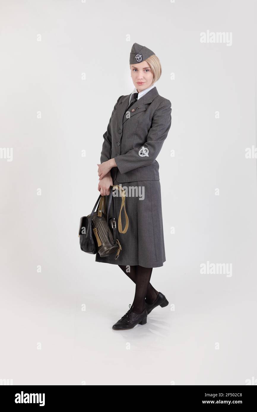 Woman actor reenactor in the historical uniform of the German army ...