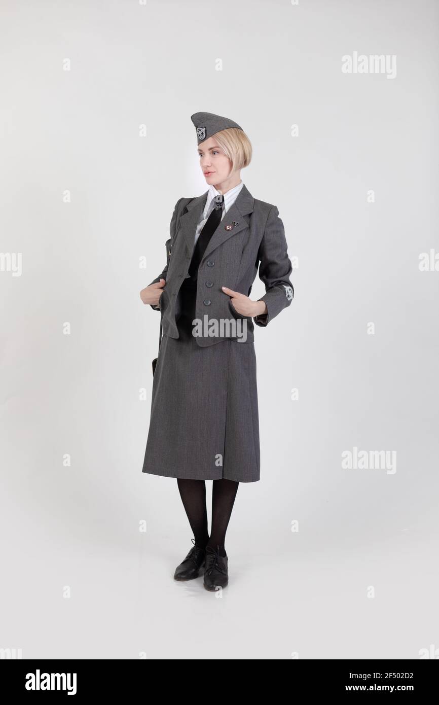 Woman actor reenactor in the historical uniform of the German army ...