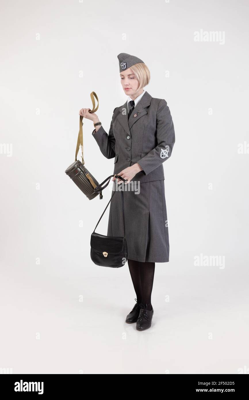 Woman actor reenactor in the historical uniform of the German army ...