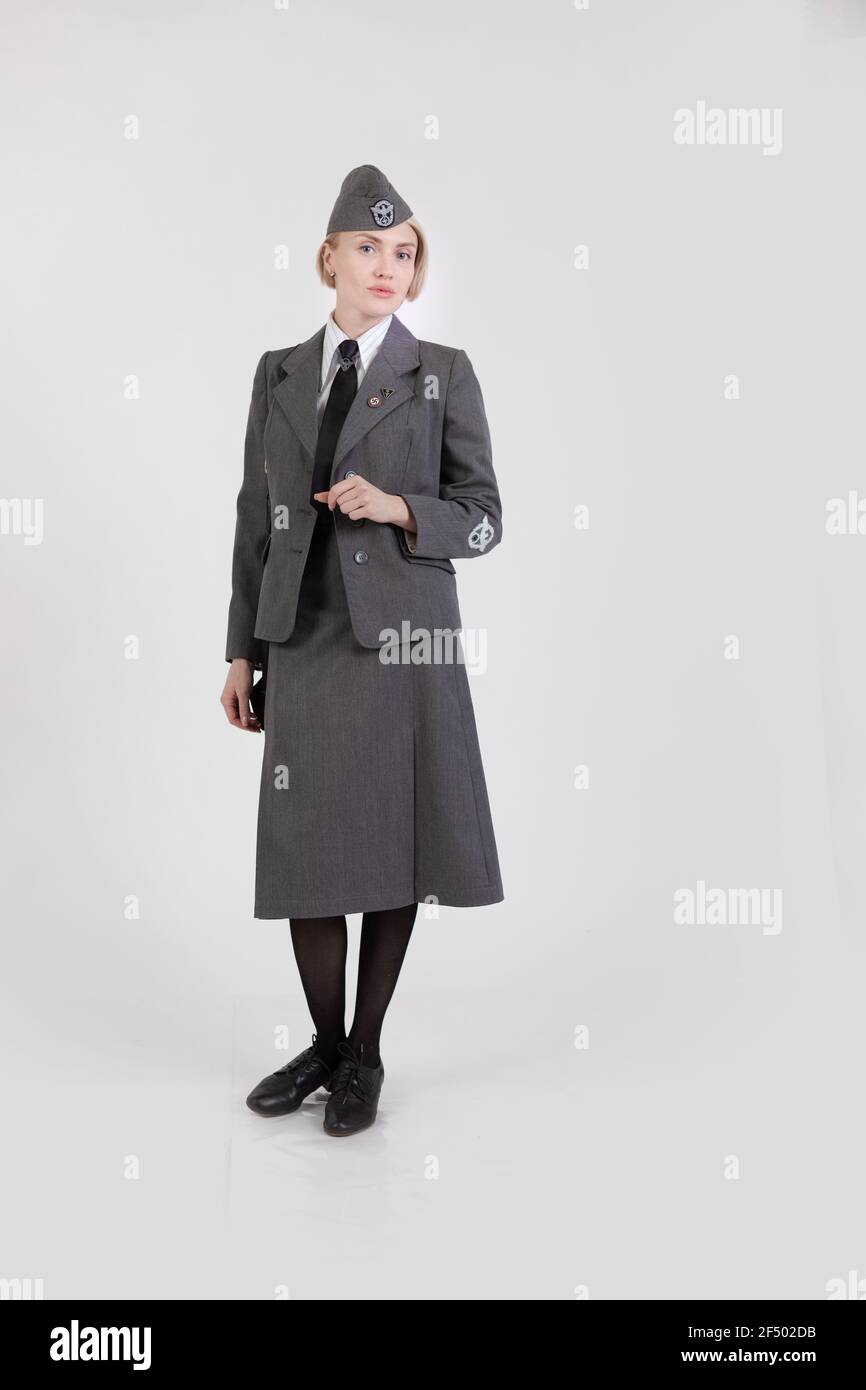 Woman actor reenactor in the historical uniform of the German army ...