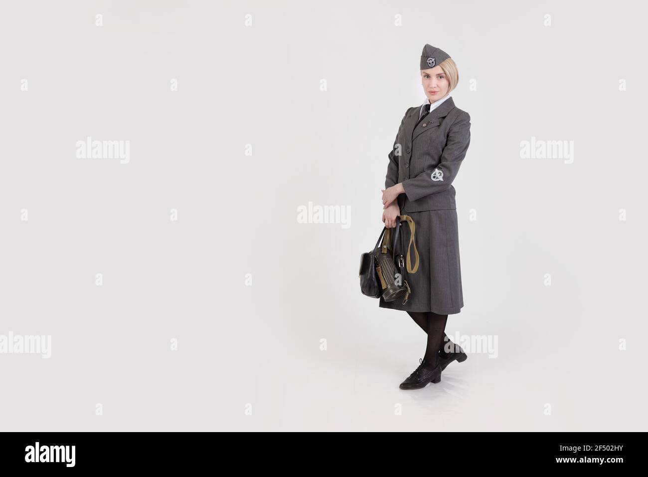 Woman actor reenactor in the historical uniform of the German army ...