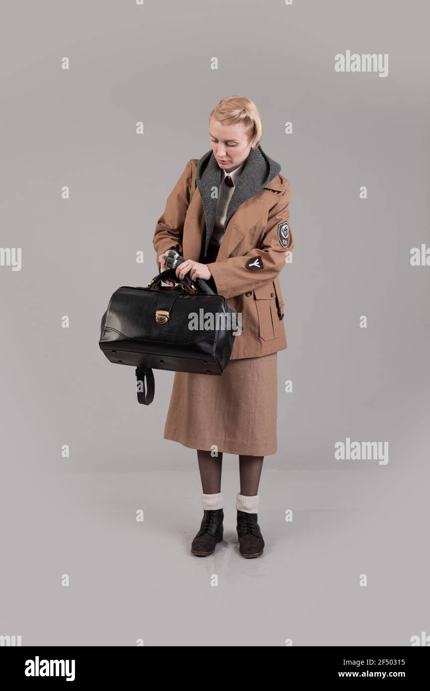 Woman actor reenactor in historical winter clothes RAD of the German ...