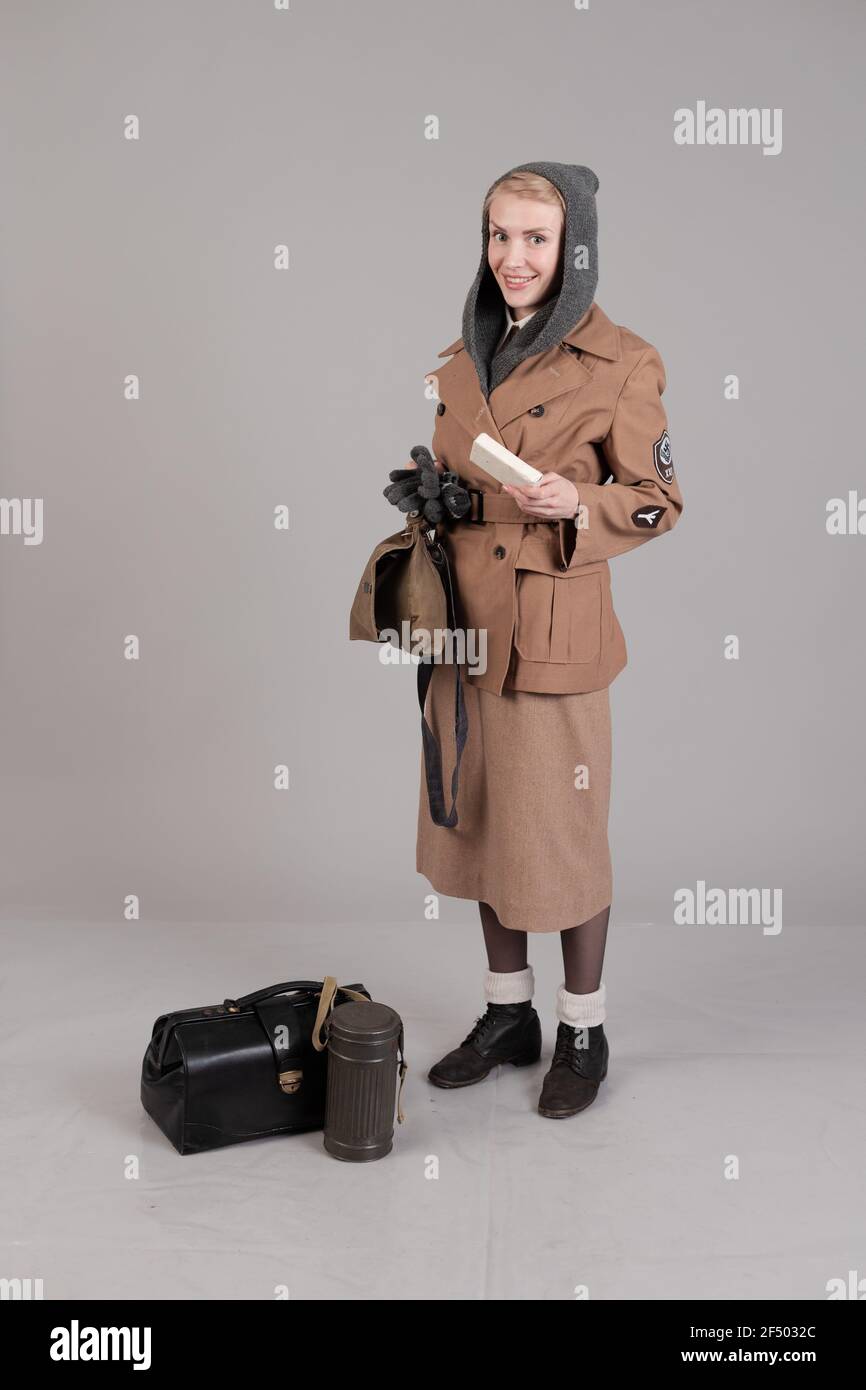 Woman actor reenactor in historical winter clothes RAD of the German ...