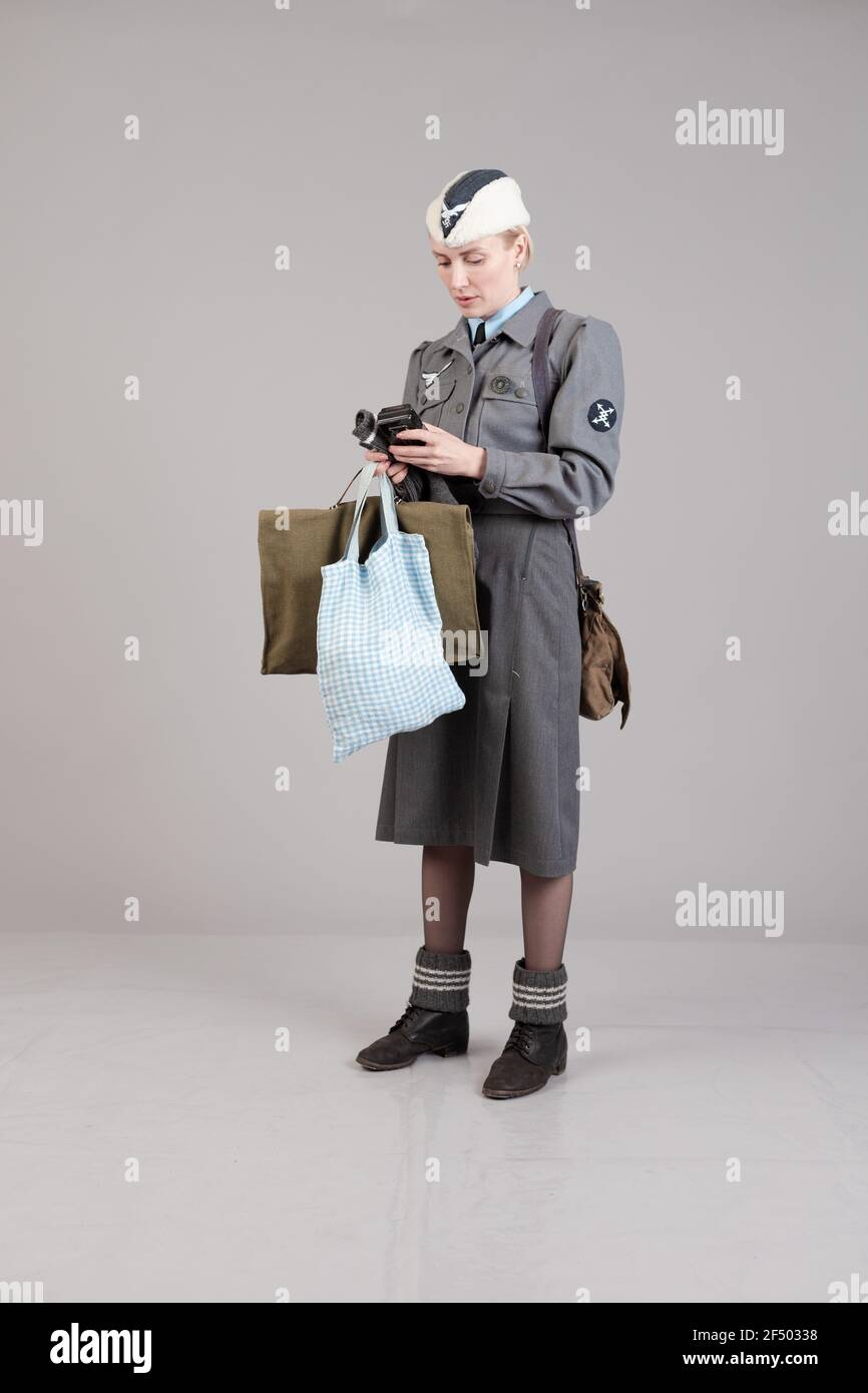 Woman actor reenactor in historical winter clothes RAD of the German ...