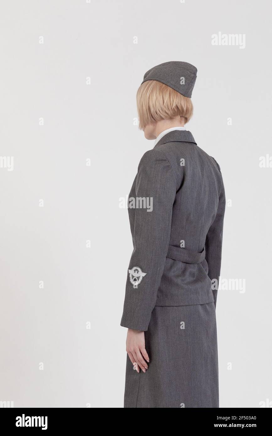 Woman actor reenactor in the historical uniform of the German army ...