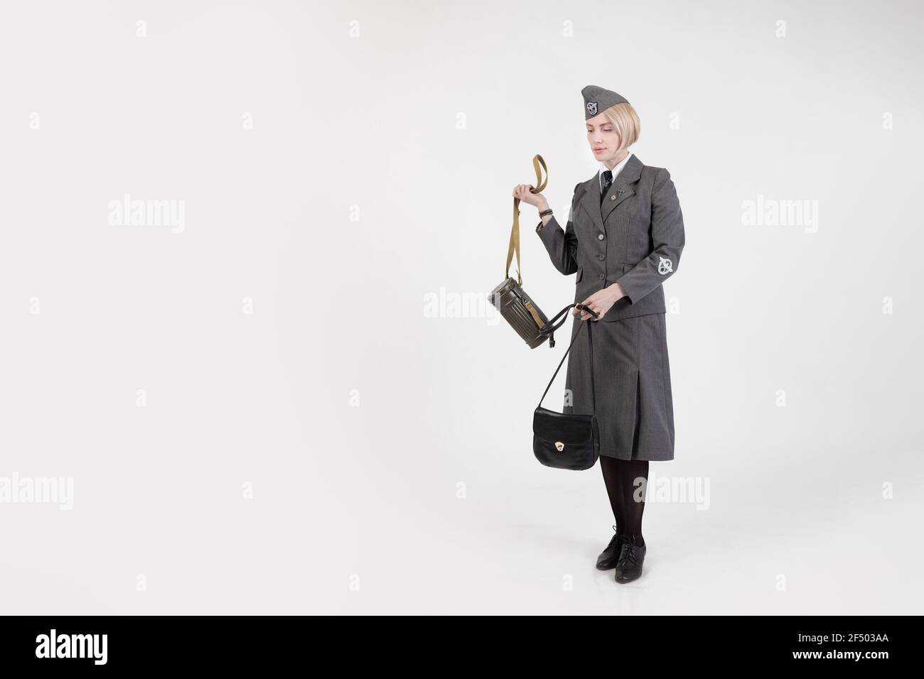 Woman actor reenactor in the historical uniform rad of the army during ...