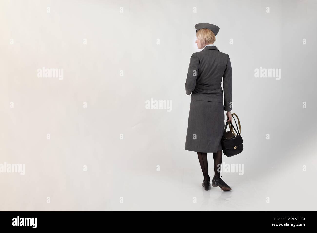 Woman actor reenactor in the historical uniform rad of the army during ...