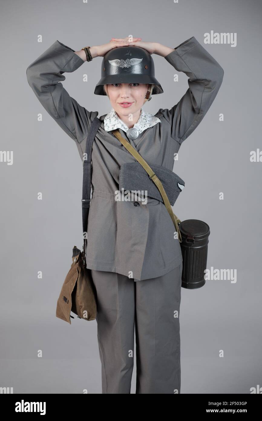 Woman actor reenactor in the historical uniform of the German army ...