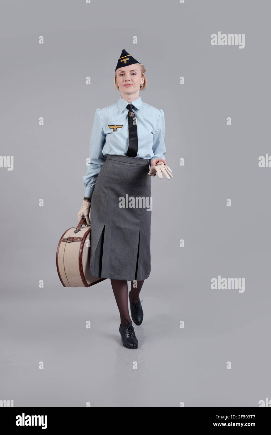 Woman actor reenactor in the historical uniform of the German army ...