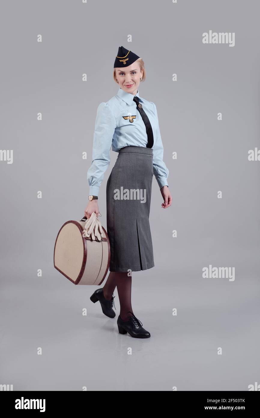 Woman actor reenactor in the historical uniform of the German army ...