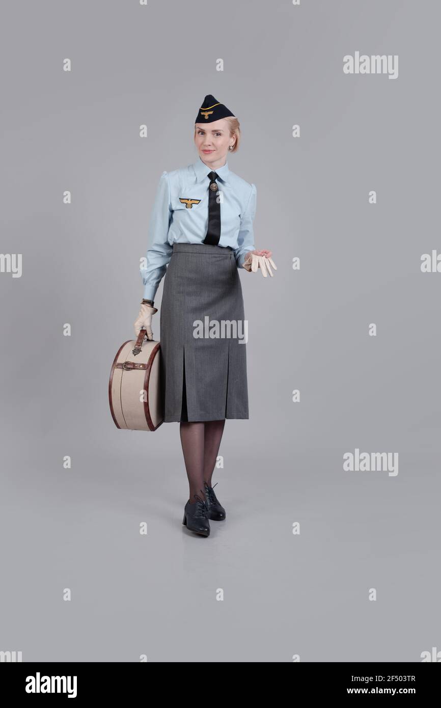 Woman actor reenactor in the historical uniform of the German army ...