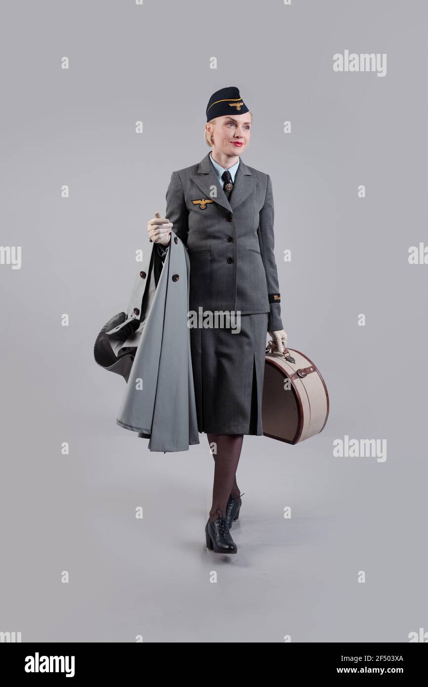 Woman actor reenactor in the historical uniform of the German army ...