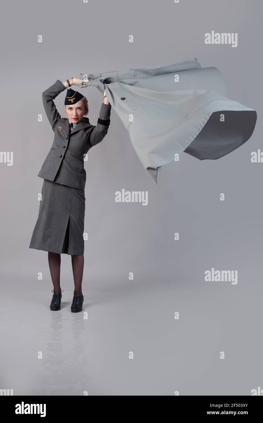 Woman actor reenactor in the historical uniform of the German army ...