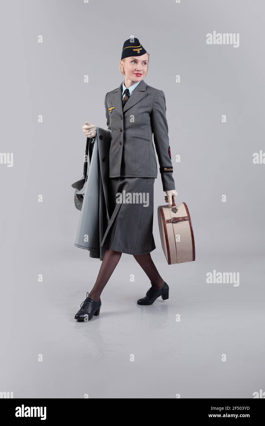 Woman actor reenactor in the historical uniform of the German army ...