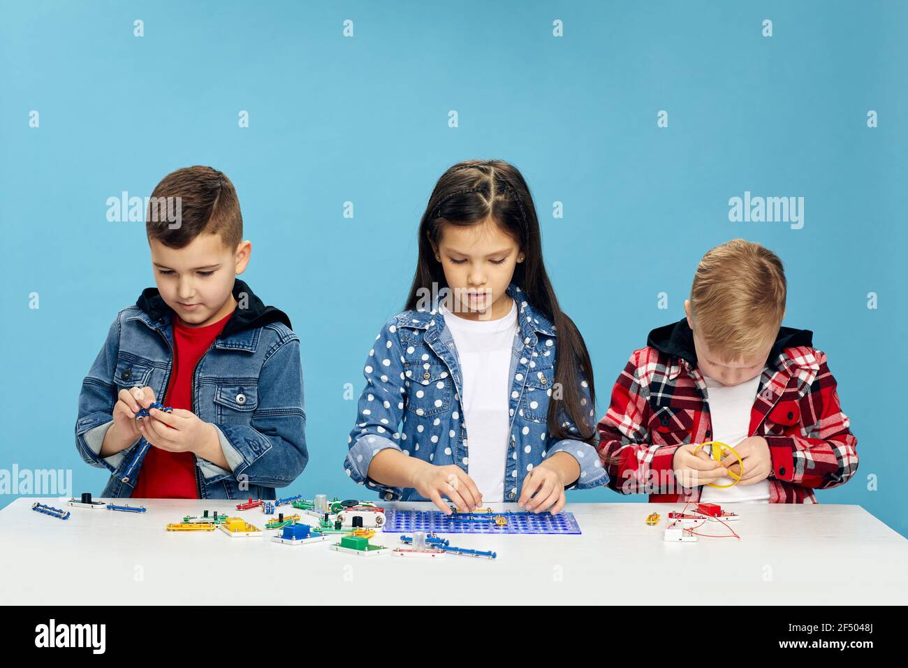 children playing with electronic constructor at studio Stock Photo - Alamy