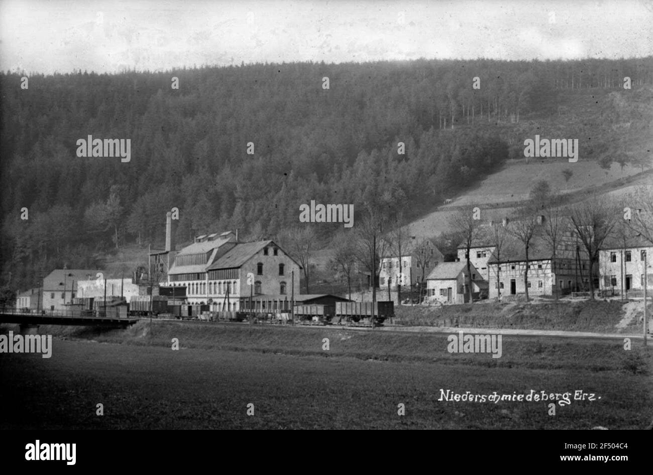 Train station with inn, factory building and village forge Stock Photo ...