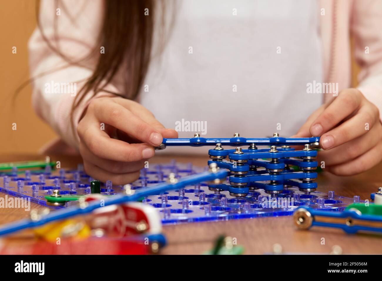 child's hands playing with children's electronic designer Stock Photo ...