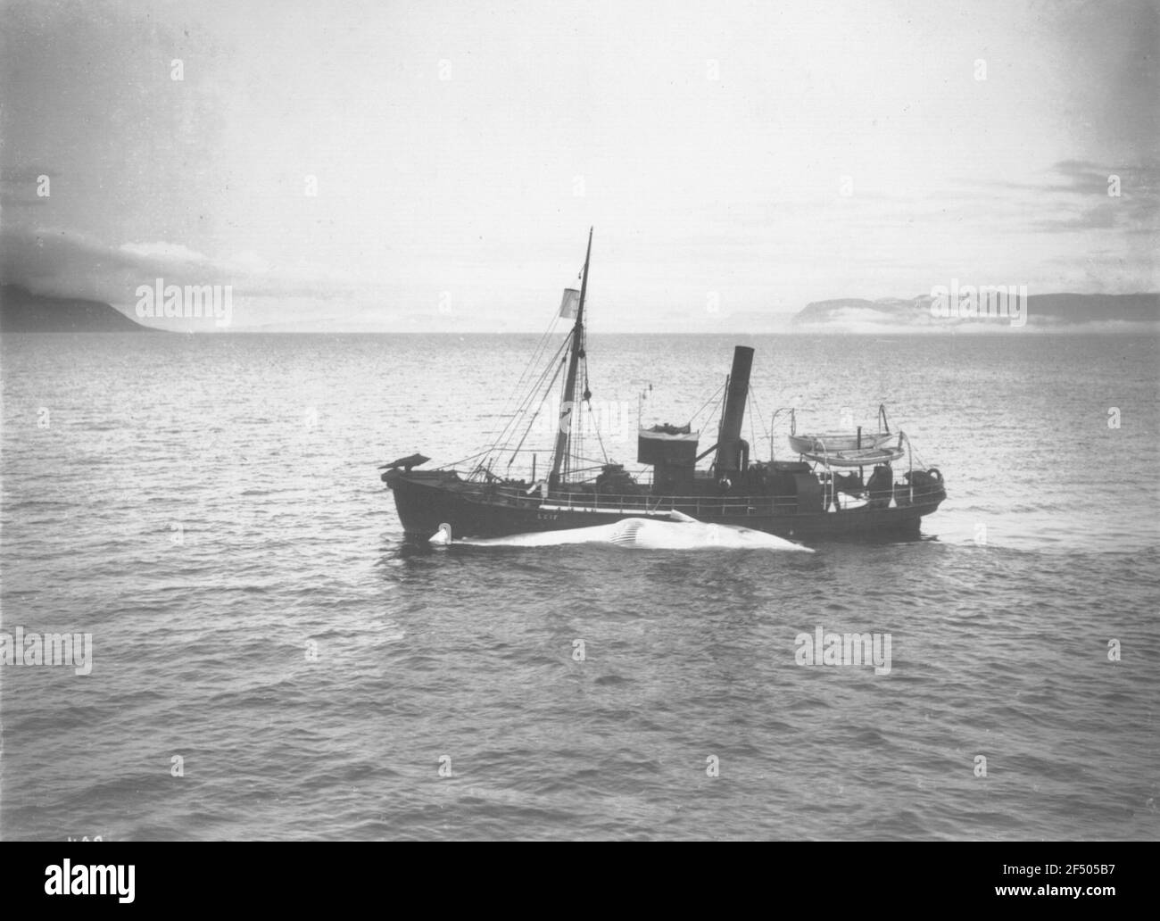 Commercial fishing vessel ocean Black and White Stock Photos & Images ...