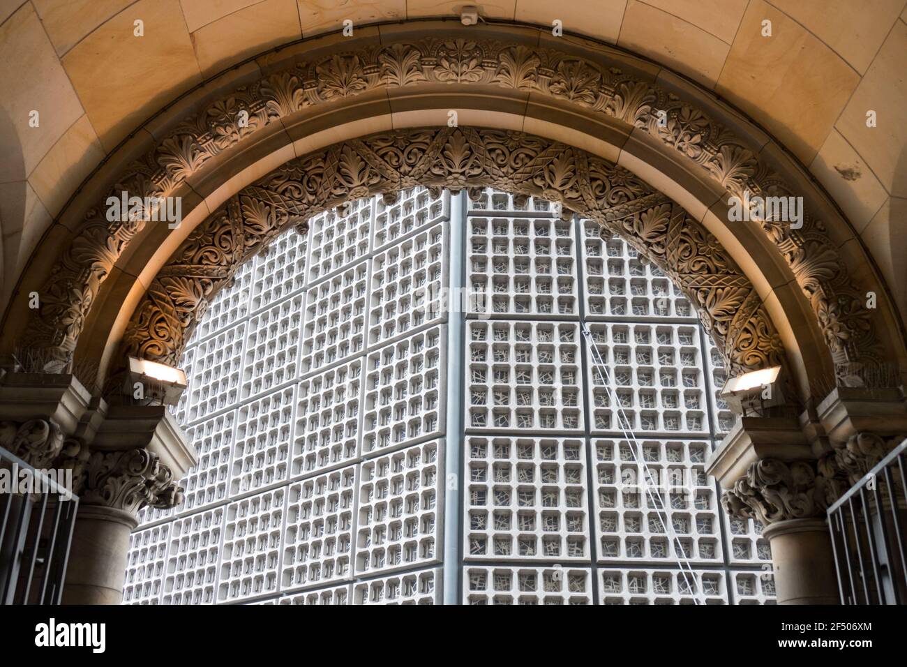 Arch of the old Kaiser Wilhelm Memorial Church and walls of the new ...