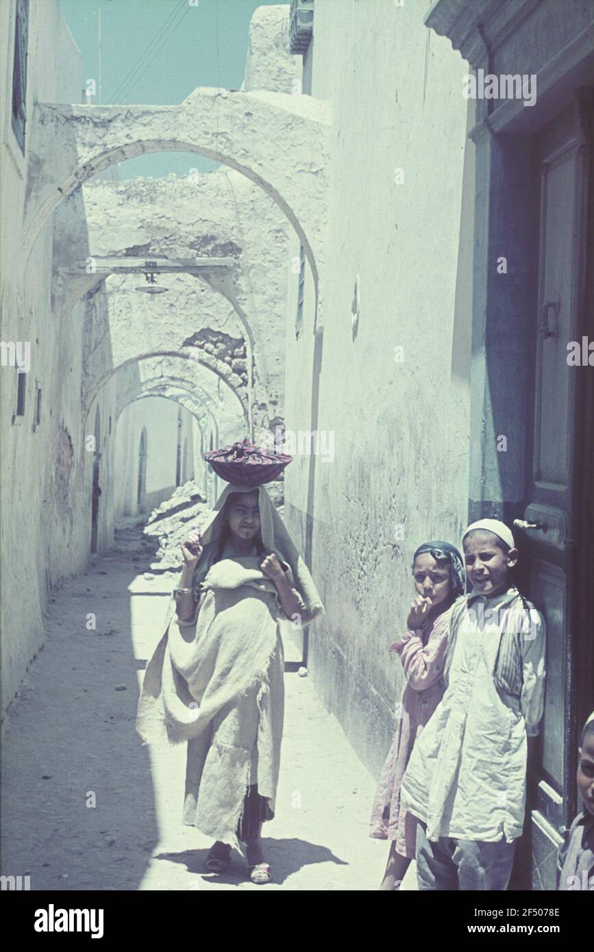 Travel photos. Libya. Tripoli. Streetscape (Jewish quarter) with three ...