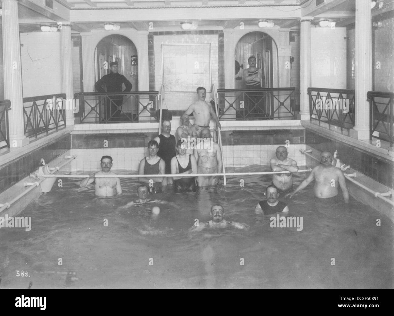 Men at the bathroom in a swimming pool aboard a passenger steamer Stock ...