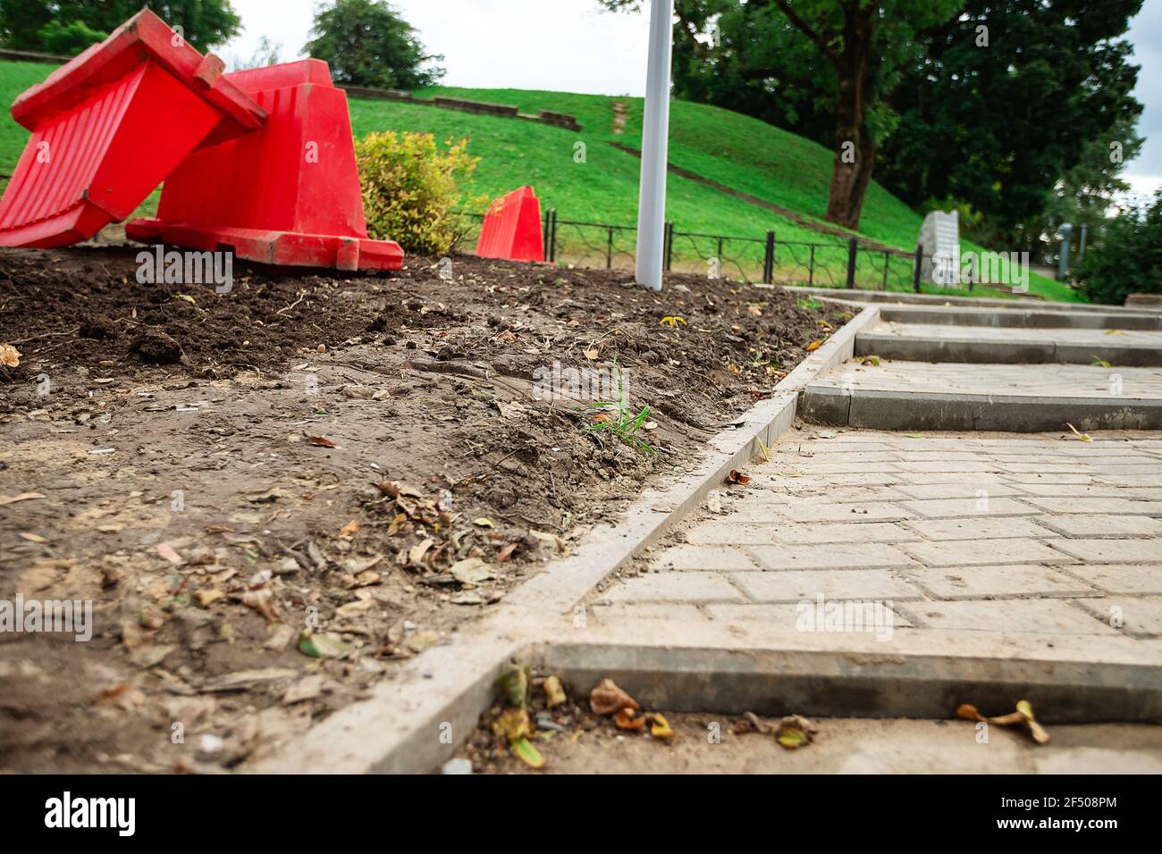 sagging paving stones. uneven pavement in the city square. sinking ...