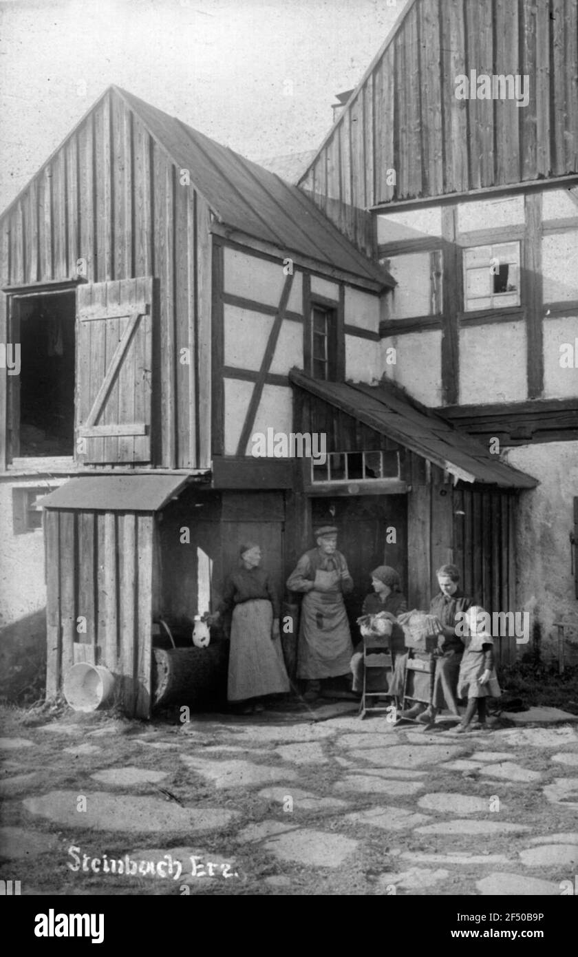 House entrance with water trough and clackers Stock Photo - Alamy