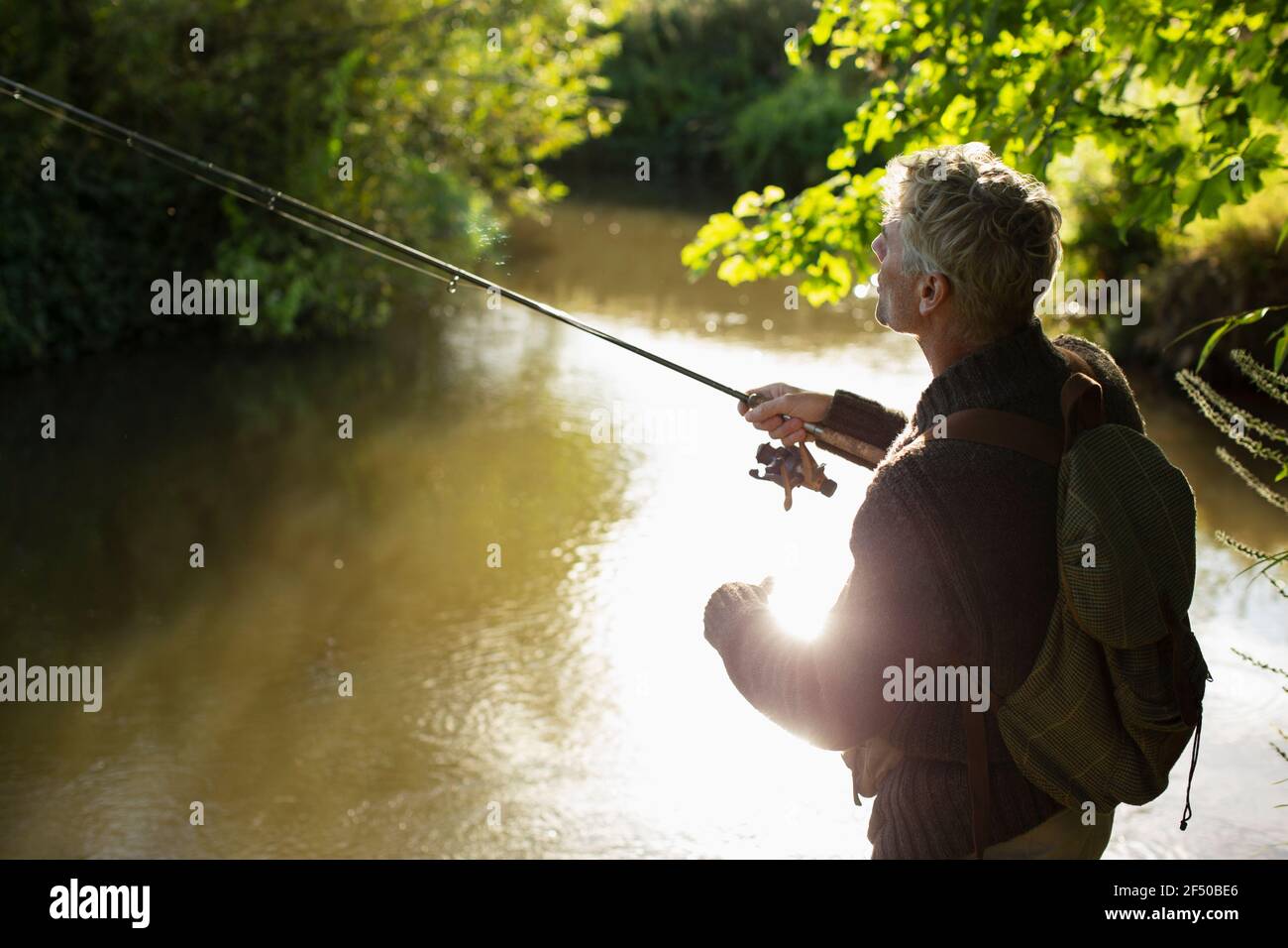 Sunny day people fishing hi-res stock photography and images - Alamy