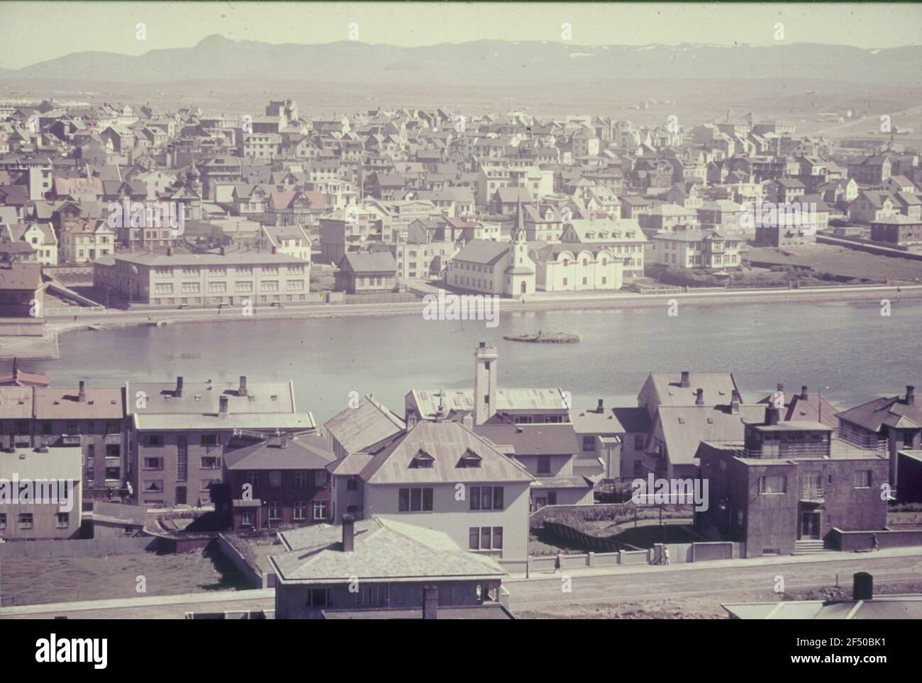 Travel photos. View to a harbor basin with church Stock Photo - Alamy
