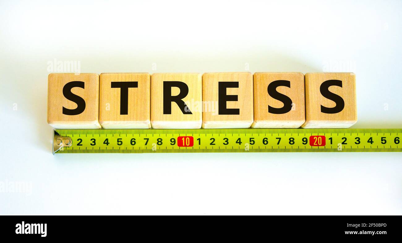 Stop stress and be health symbol. Wooden cubes with the word 'stress ...