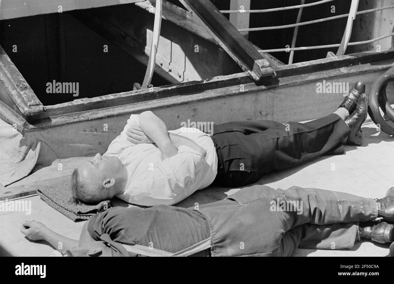 Man sunbathing Black and White Stock Photos & Images - Alamy
