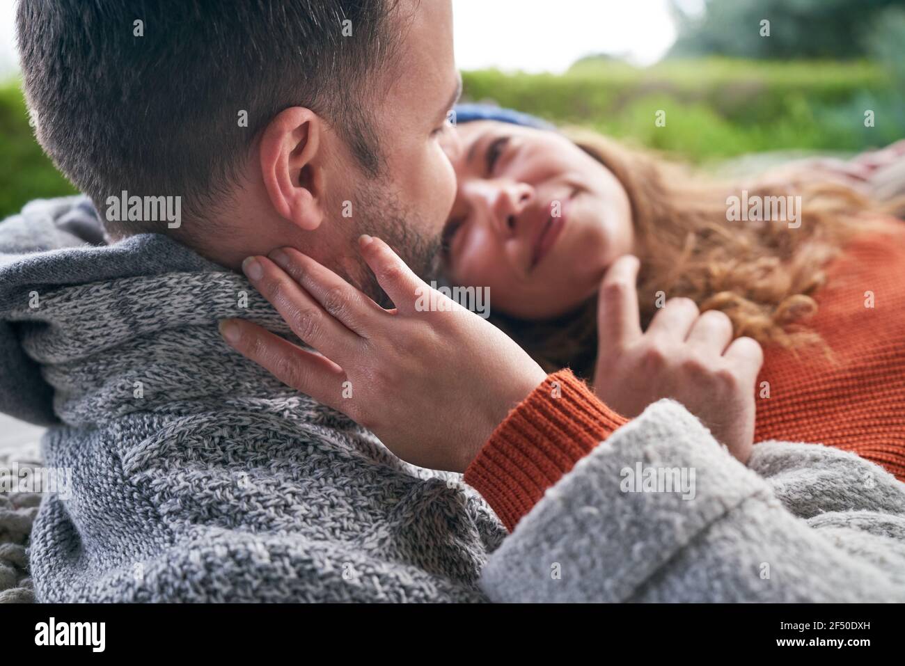 Close up affectionate romantic couple cuddling Stock Photo - Alamy