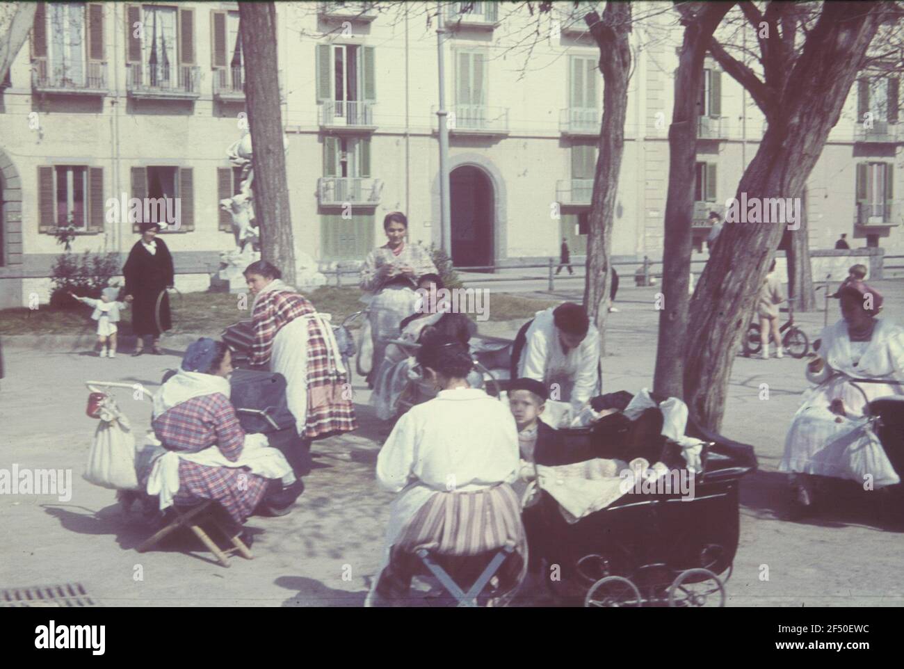 Travel photos. Group of nanny with stroller Stock Photo - Alamy