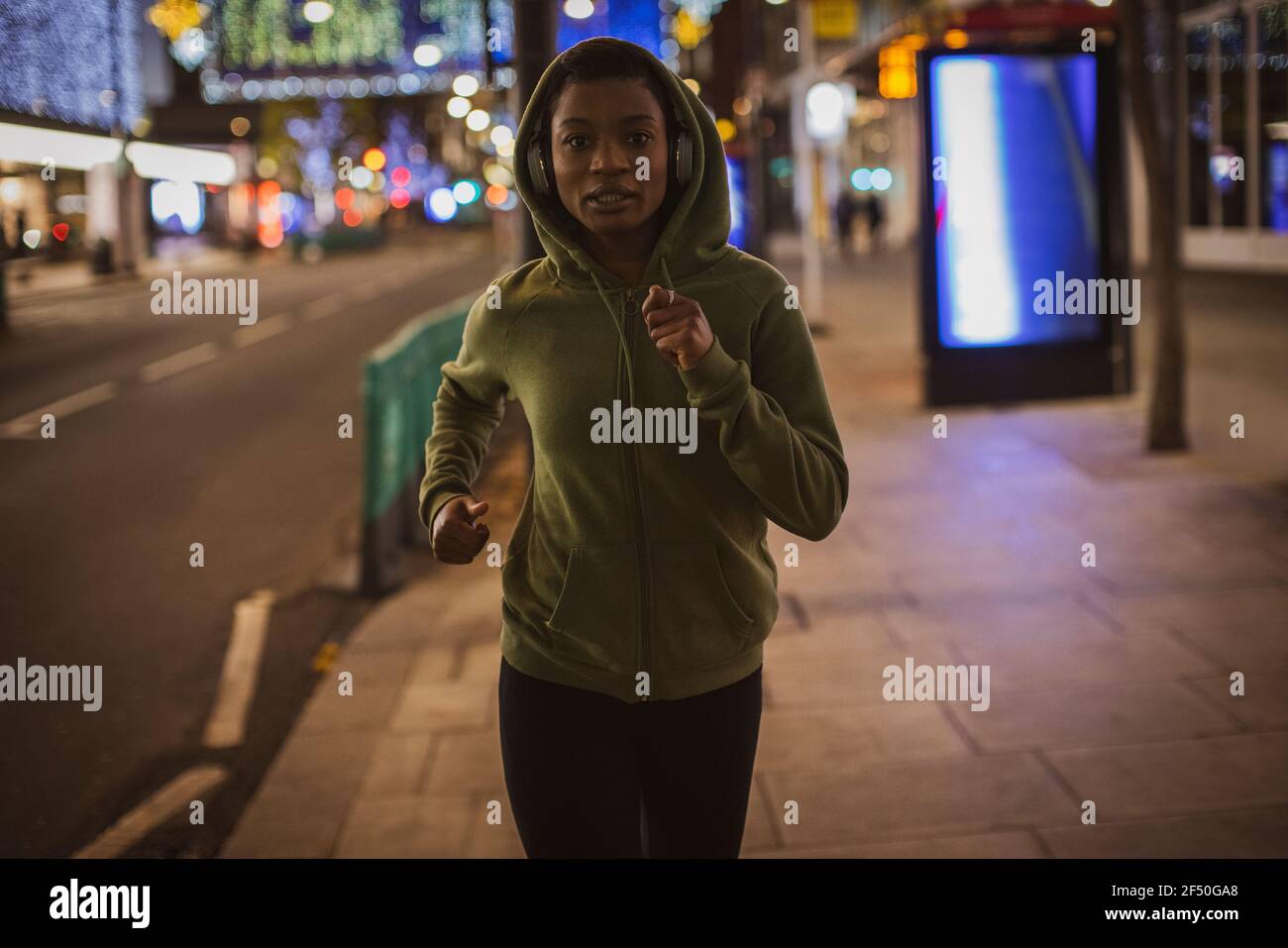 Woman jog night hi-res stock photography and images - Alamy