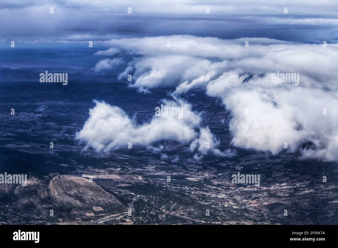 Clouds and landscape background from an airplane Stock Photo - Alamy