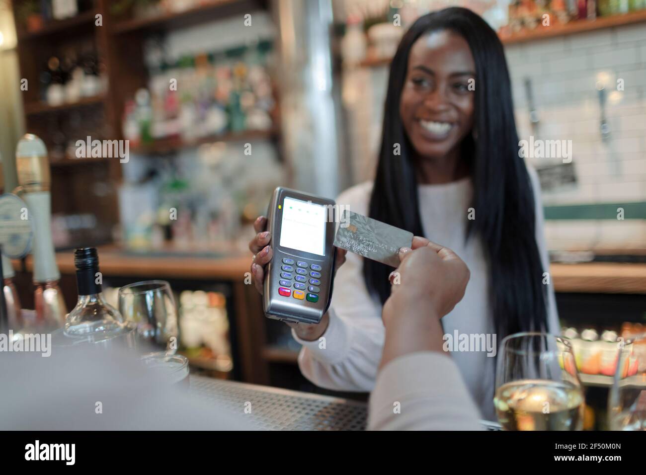 Long bar customer hi-res stock photography and images - Alamy