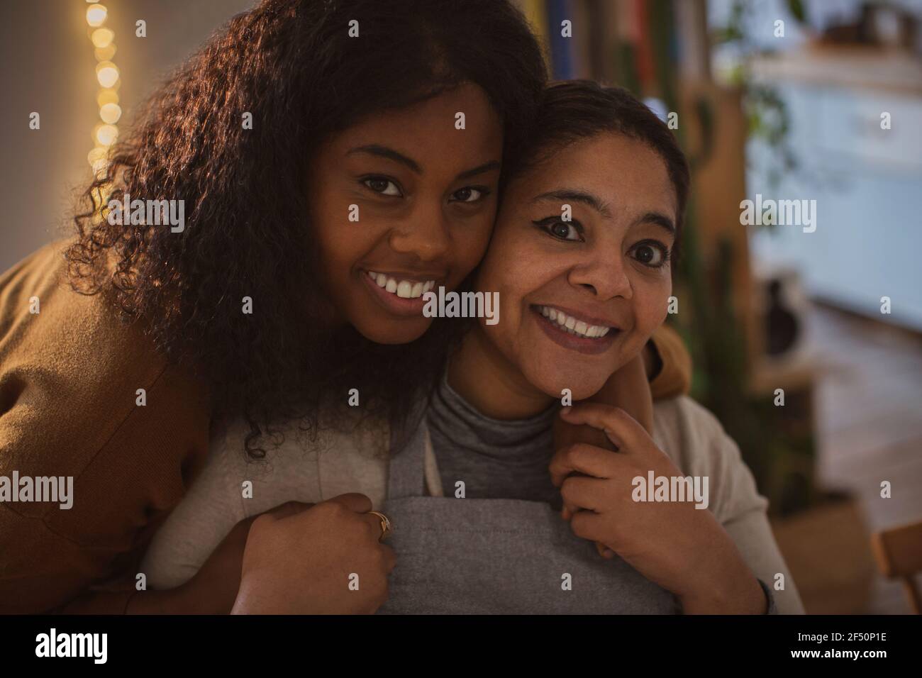 Portrait happy mother and daughter hugging Stock Photo - Alamy