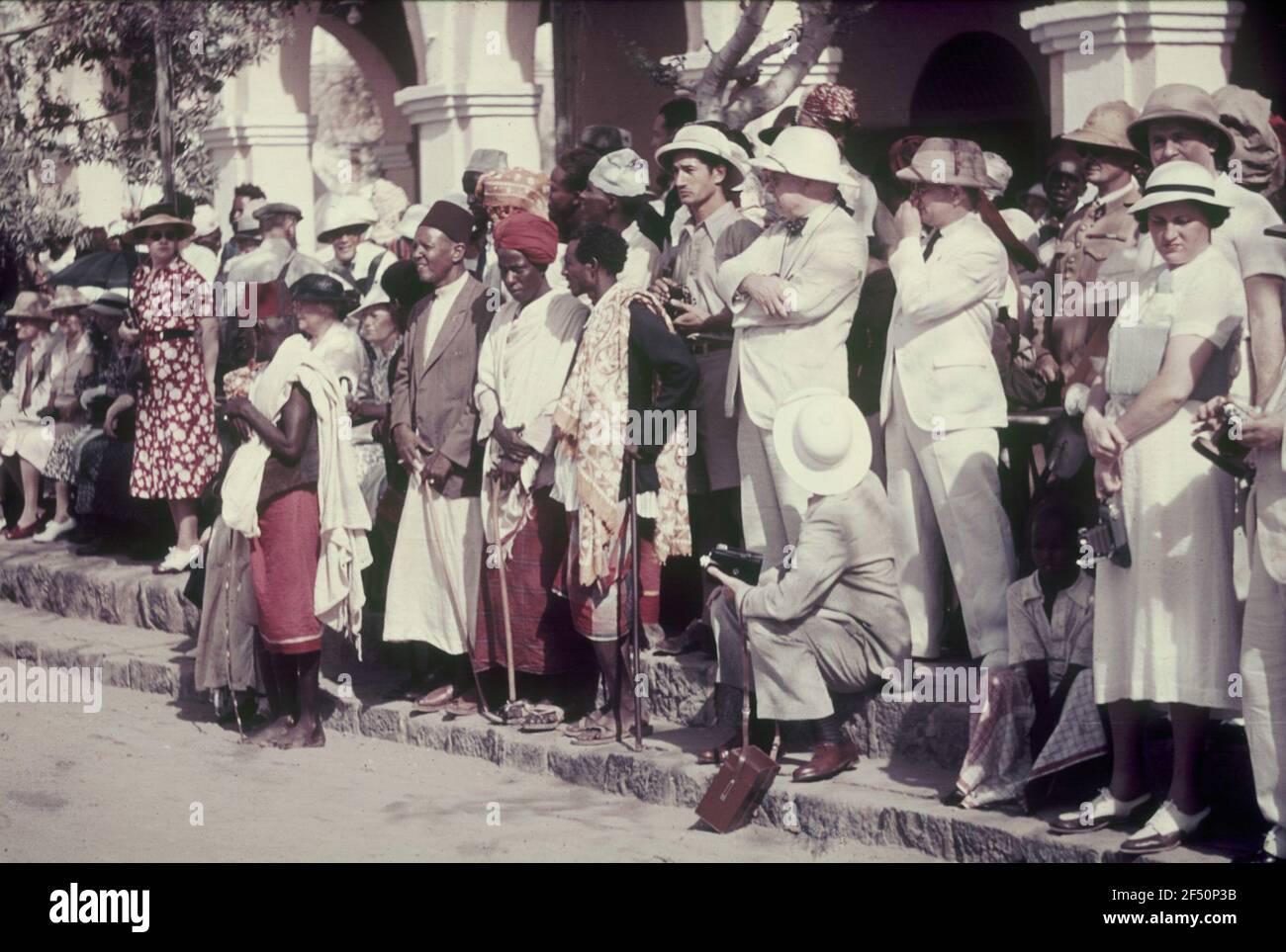 Travel photos. Viewers of an event on the roadside, North Africa Stock ...