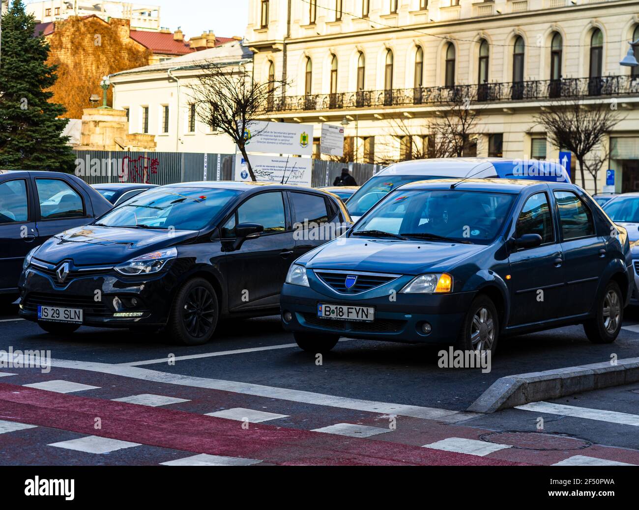 Car traffic at rush hour in downtown area of the city. Car pollution ...