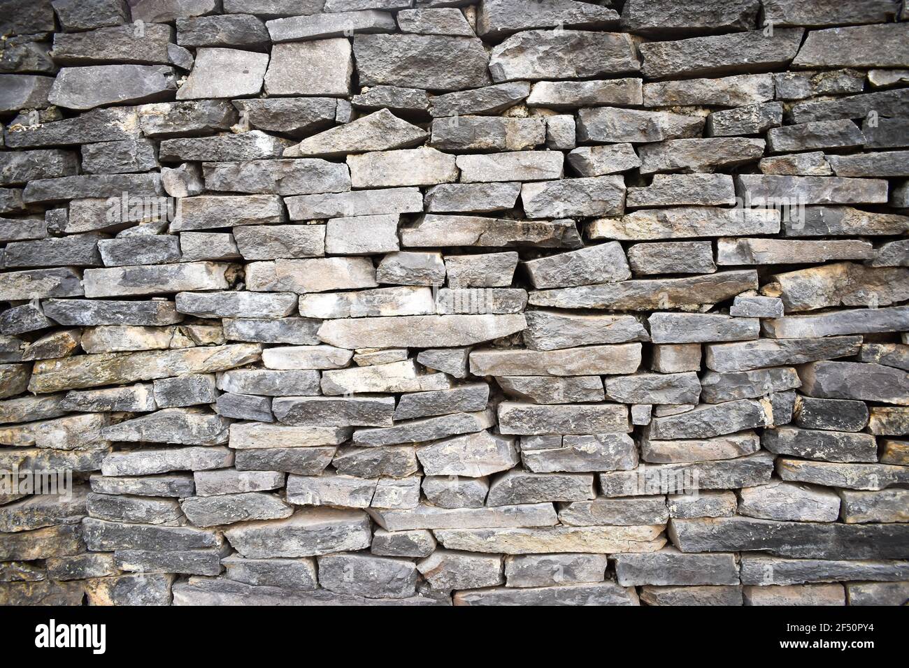 Cobblestone wall texture for backgrounds Stock Photo - Alamy