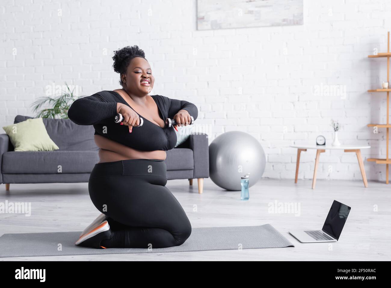 Plus size woman exercising hi-res stock photography and images - Alamy
