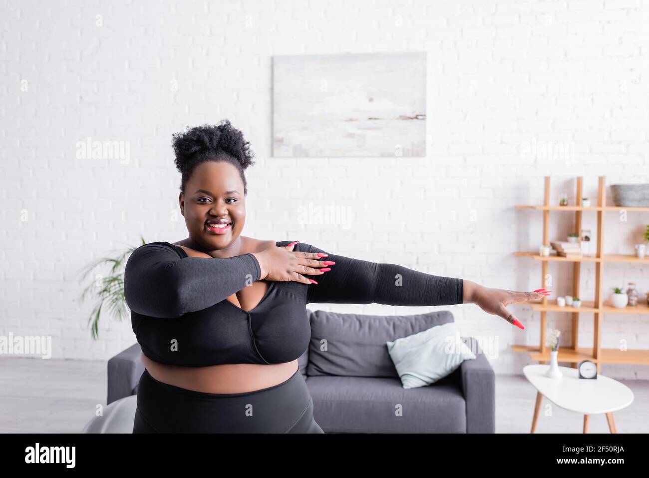 Joyful attractive plus size african hi-res stock photography and images ...