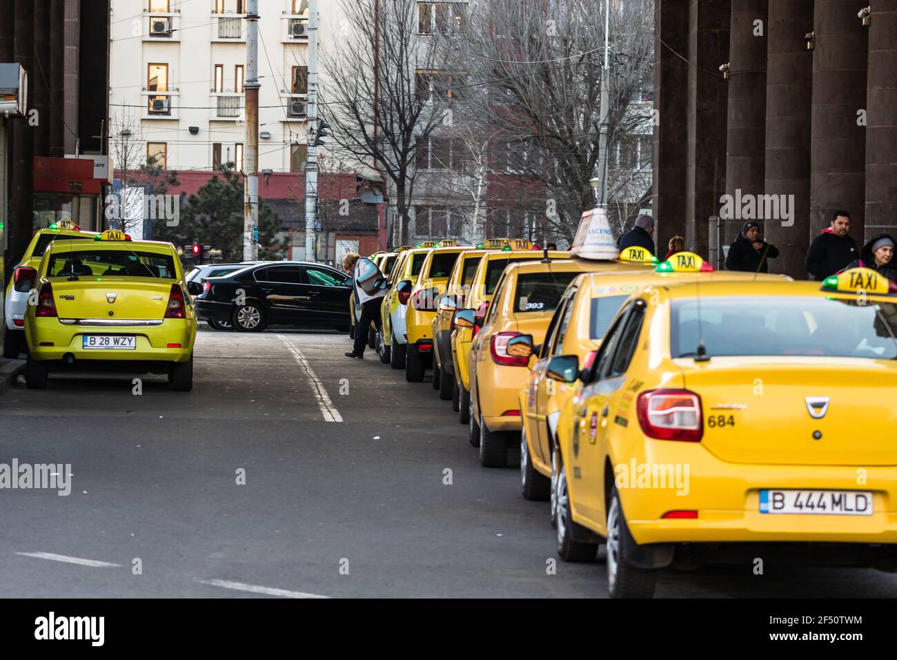 Car in traffic, modern city taxi service. Taxi cars parked at the taxi ...