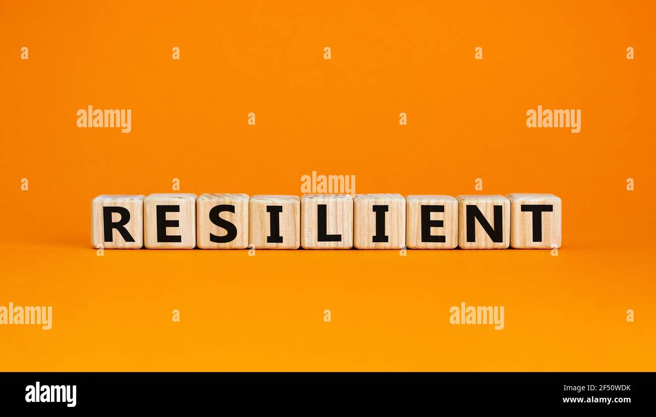 Resilient symbol. Wooden cubes with the word 'resilient'. Beautiful ...