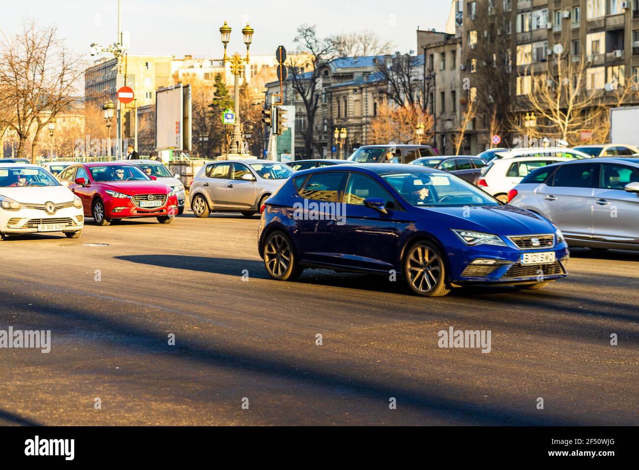 Car traffic at rush hour in downtown area of the city. Car pollution ...