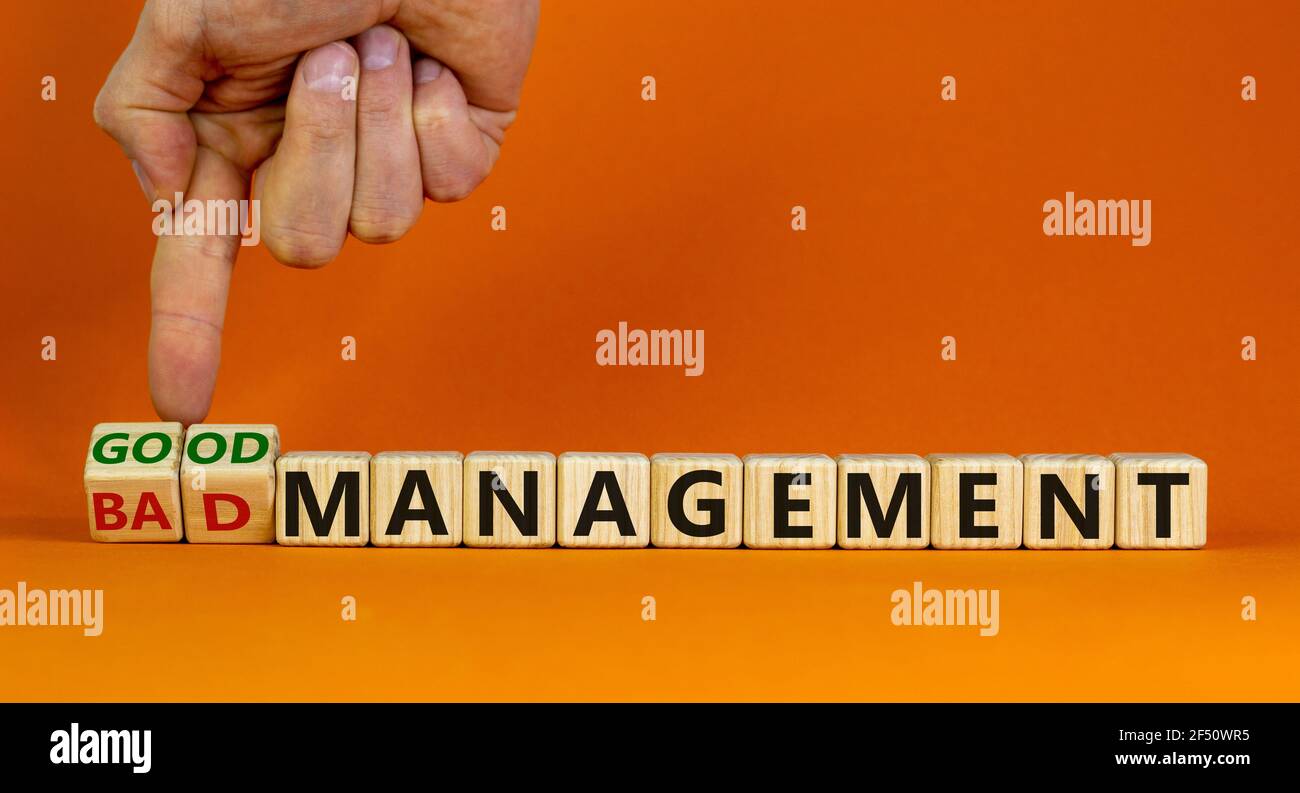 Good or bad management symbol. Businessman turns cubes and changes ...