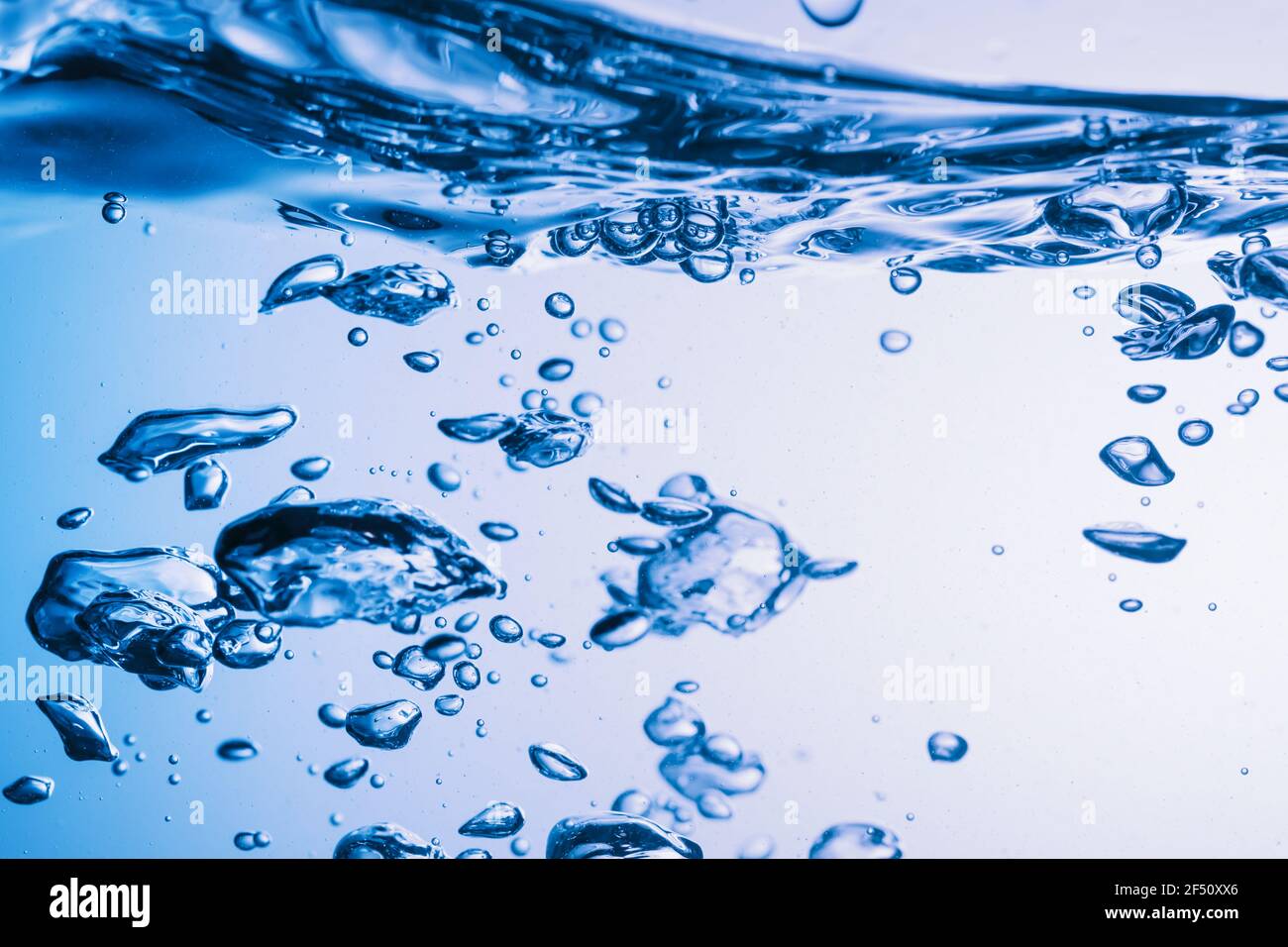 Clear water surface with ripple and bubble Stock Photo - Alamy