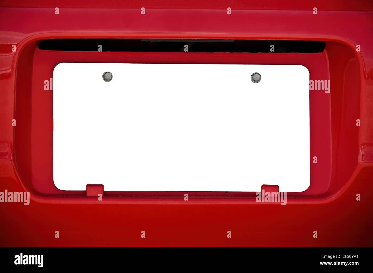 Horizontal shot of a blank white license plate on a red car. This is a ...
