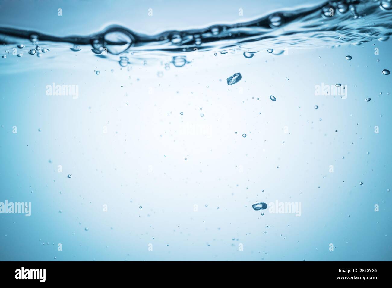 Clear water surface with ripple and bubble Stock Photo - Alamy